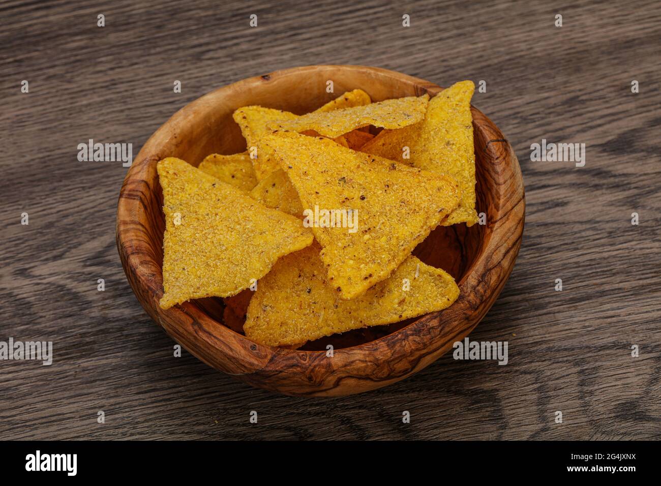 Mexican crunchy corn nachos triangle heap Stock Photo - Alamy