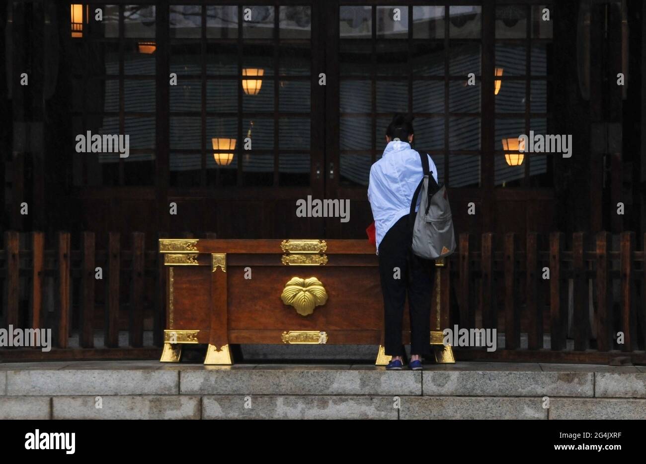 Japanese girl praying in a shrine, Tokyo, Japan Stock Photo - Alamy