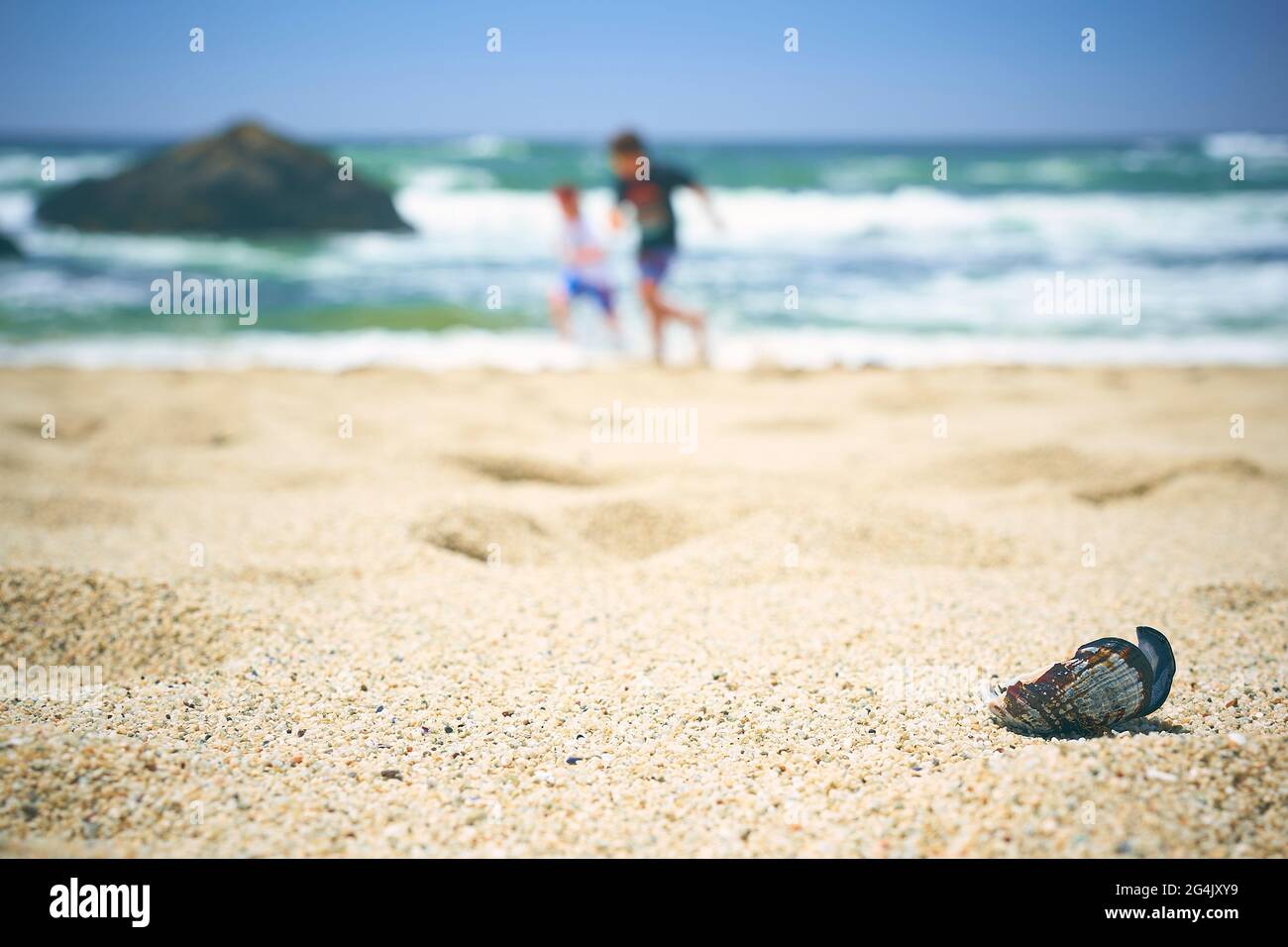 Two boys playing in the sand hi-res stock photography and images - Alamy