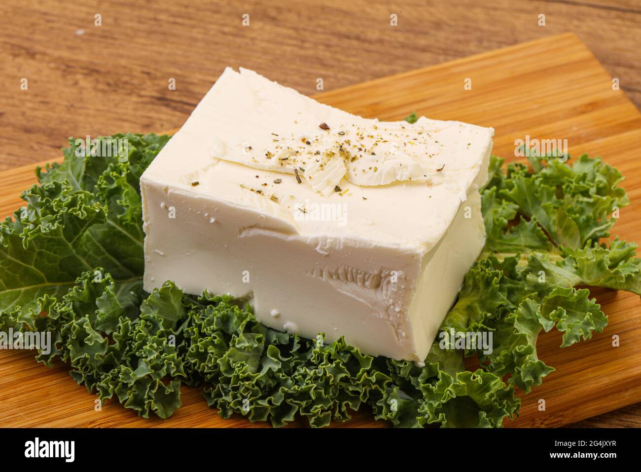 Traditional tasty Greek Feta soft cheese brick Stock Photo - Alamy