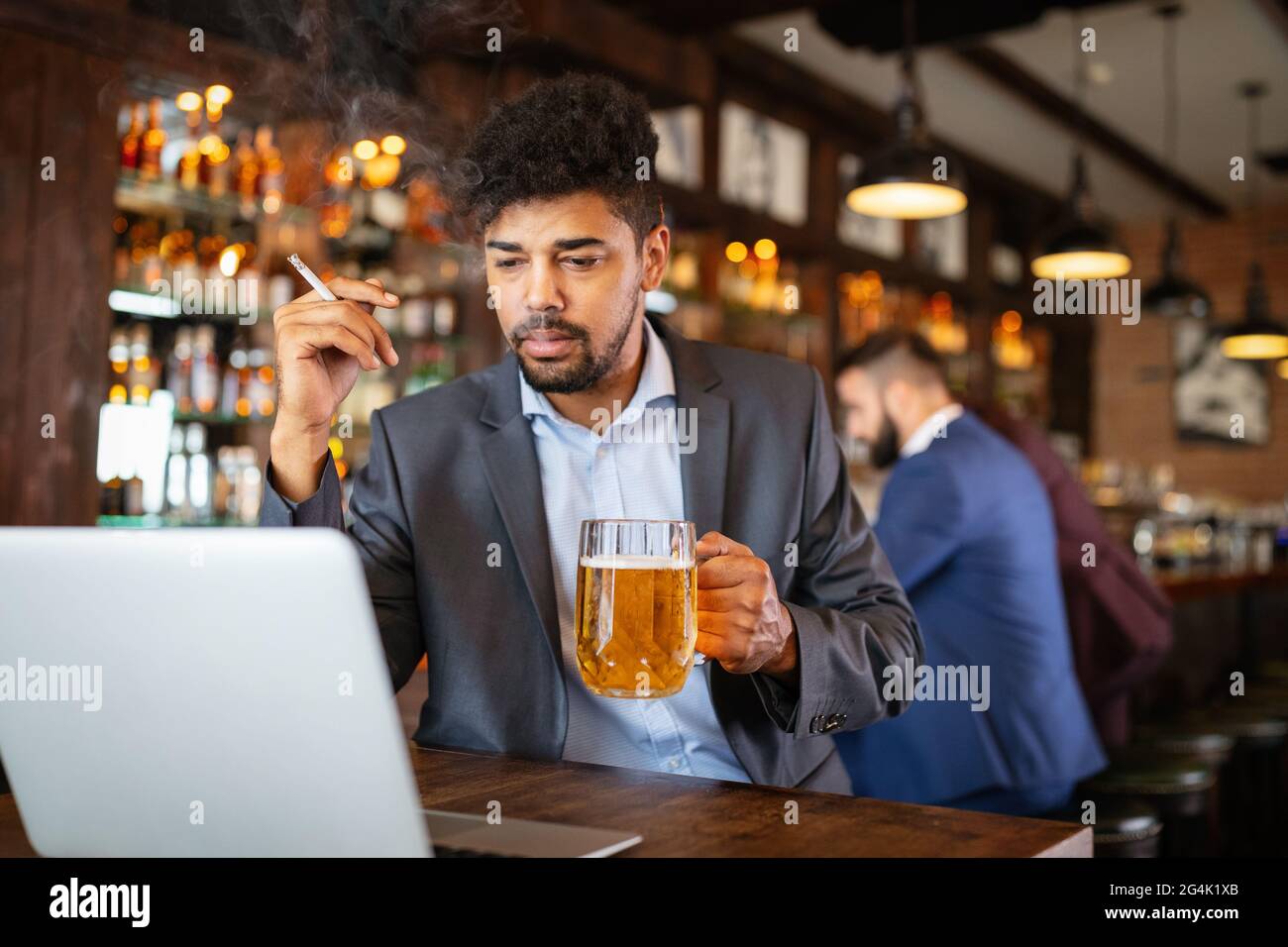 Drunk man drinking alcohol working hi-res stock photography and images ...