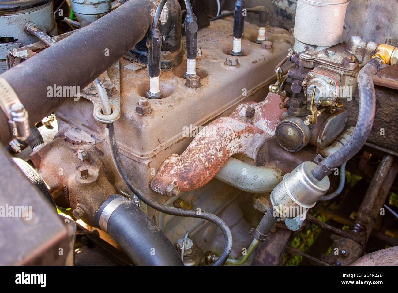 Closeup of a retro car engine with pipes and cylinder Stock Photo - Alamy