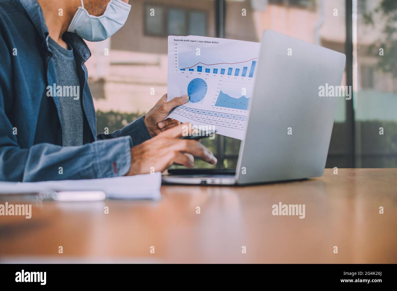 Man worker working business report on computer in office Stock Photo ...