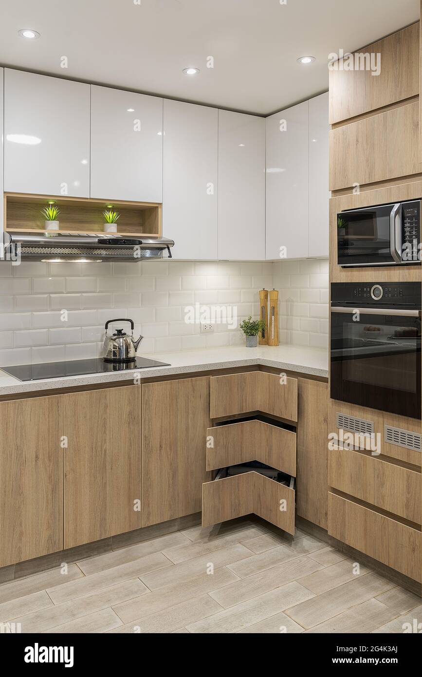 Built-in ovens and electric griddle in the kitchen modules Stock Photo ...