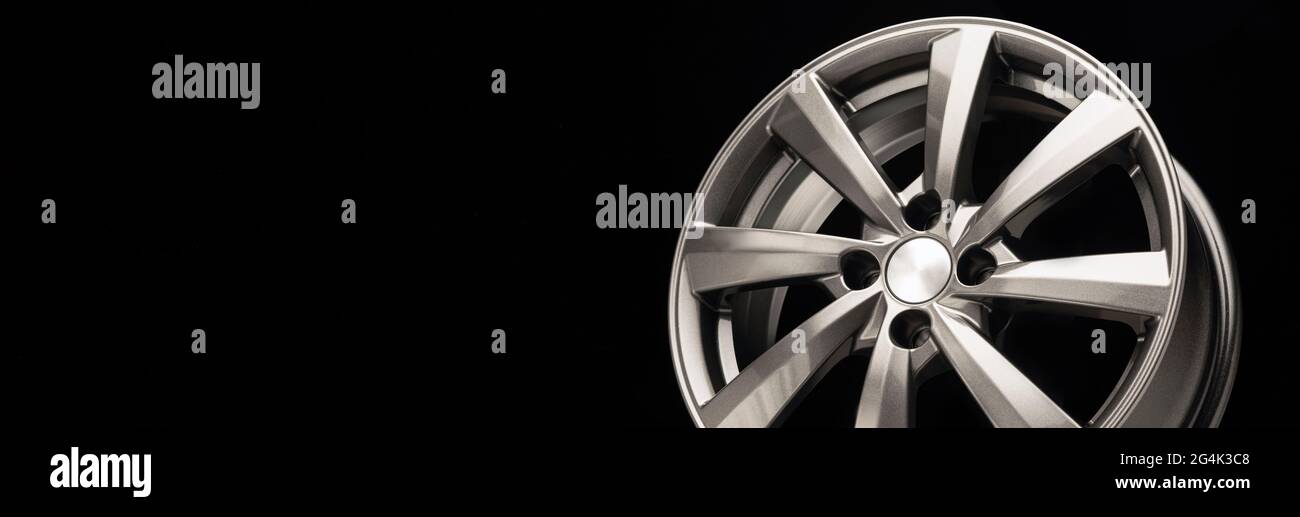 grey alloy wheel, modern auto parts. black background copy space Stock ...