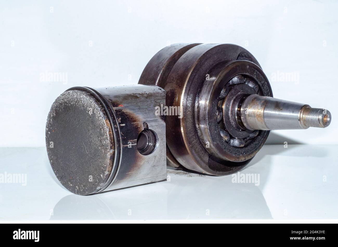 Seizure due to overheating mainly piston crown isolated on a white ...