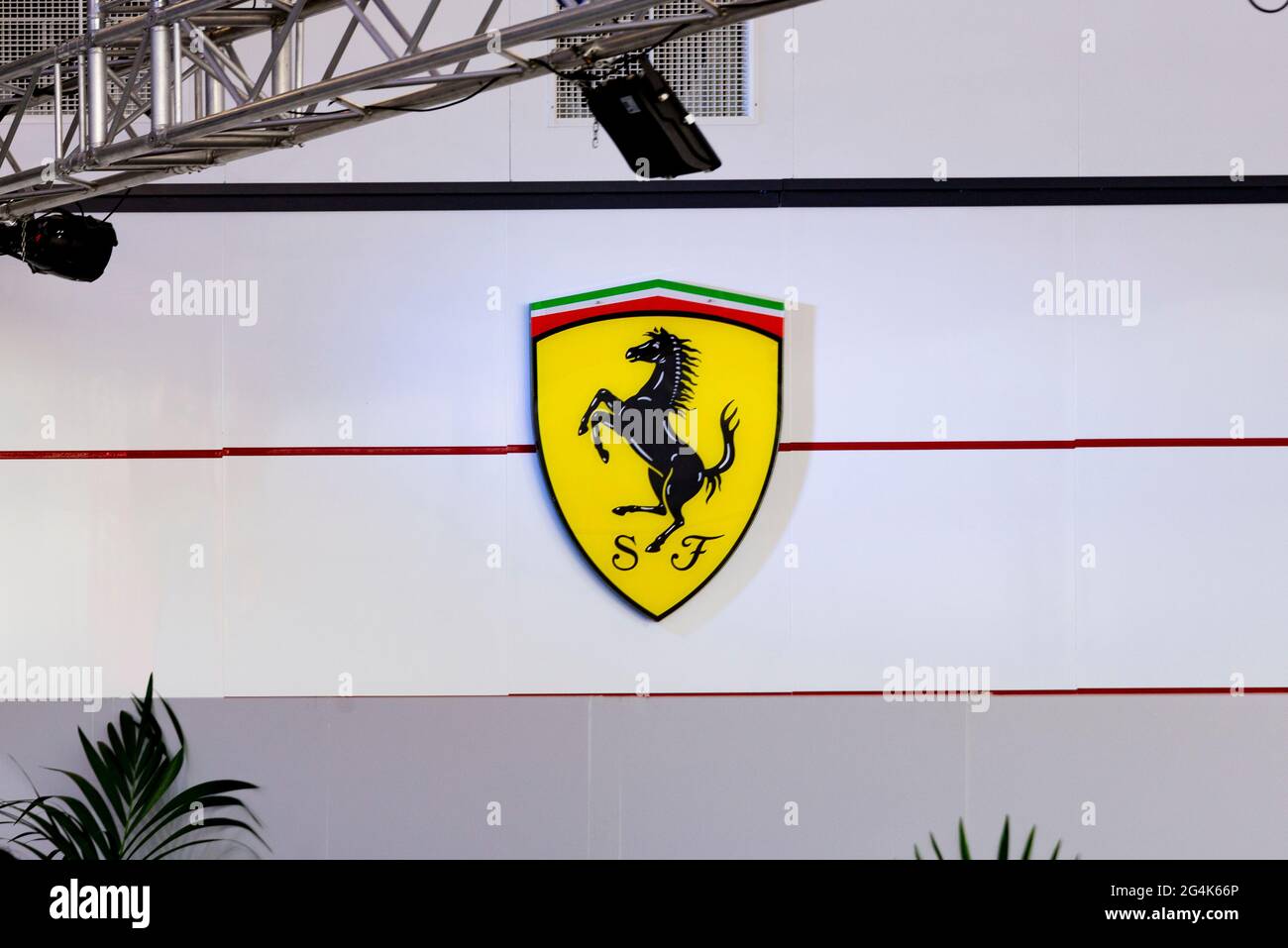 A Ferrari logo seen inside a shop during the Ferrari Challenge races at ...