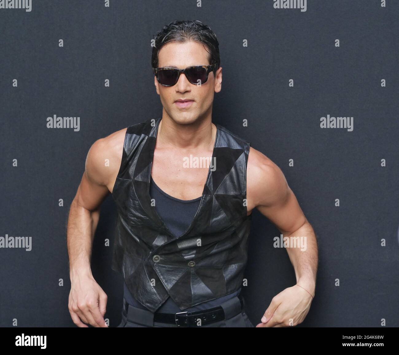 Italian top model Fabio Mancini posing for photographers after Armani ...