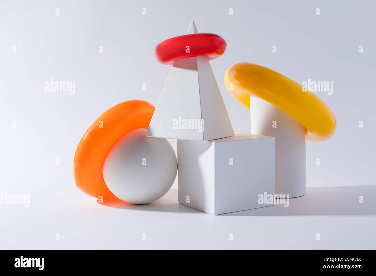 Variety of colorful geometric objects on white background Stock Photo ...