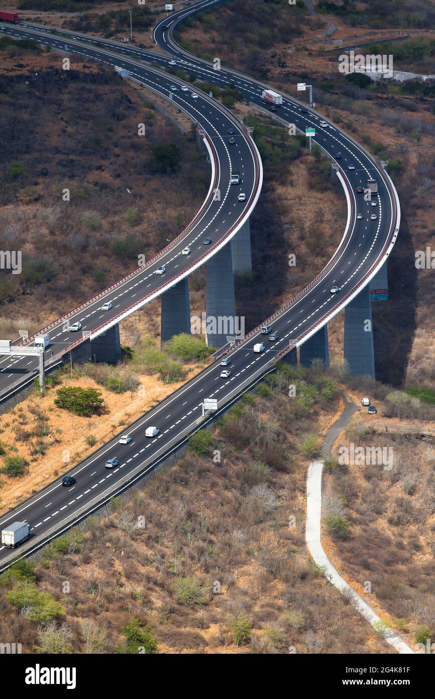 Reunion Island: aerial view of the major highway “Route nationale 1” or ...