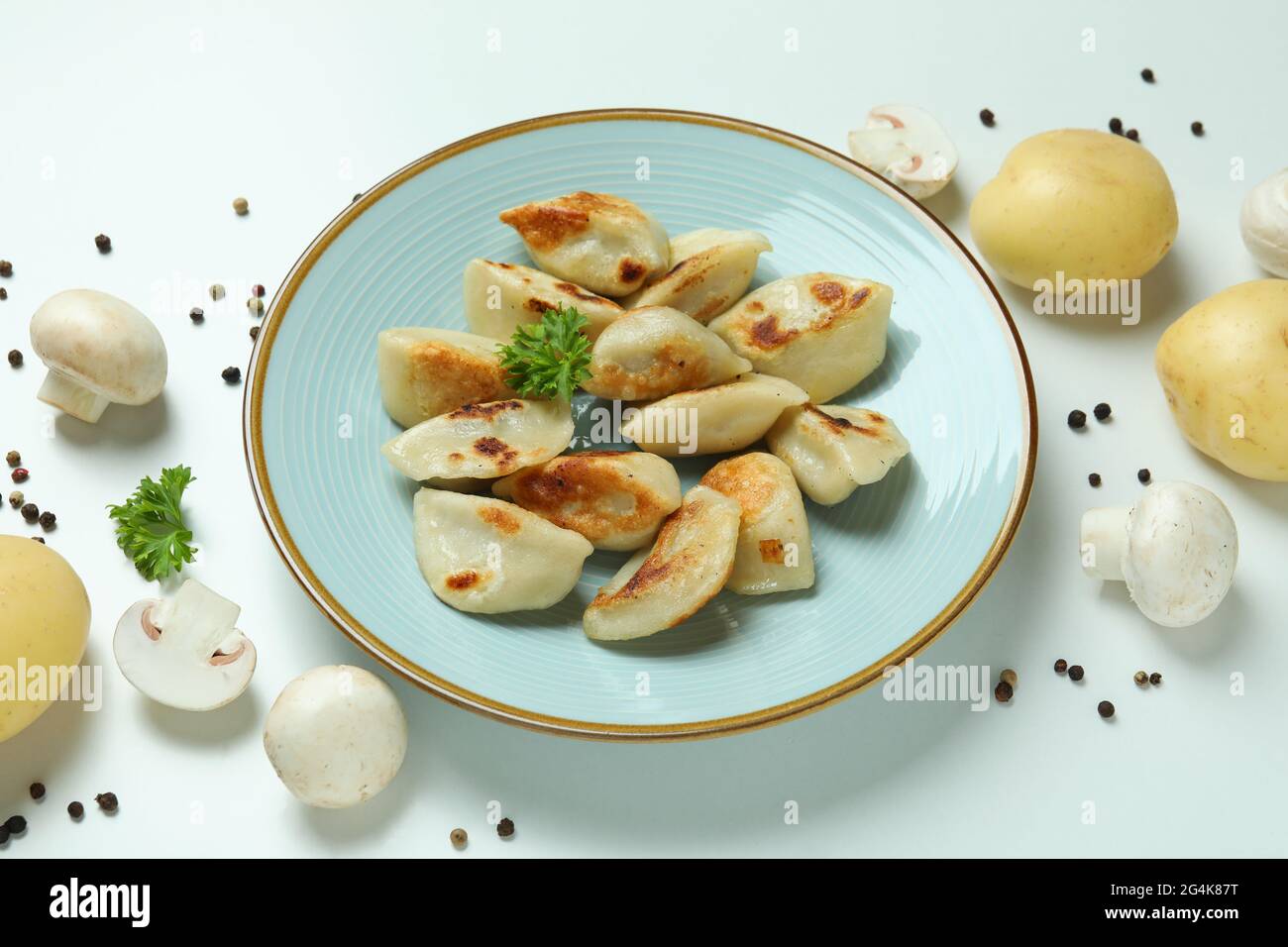 Concept of tasty food with vareniki or pierogi on white background ...