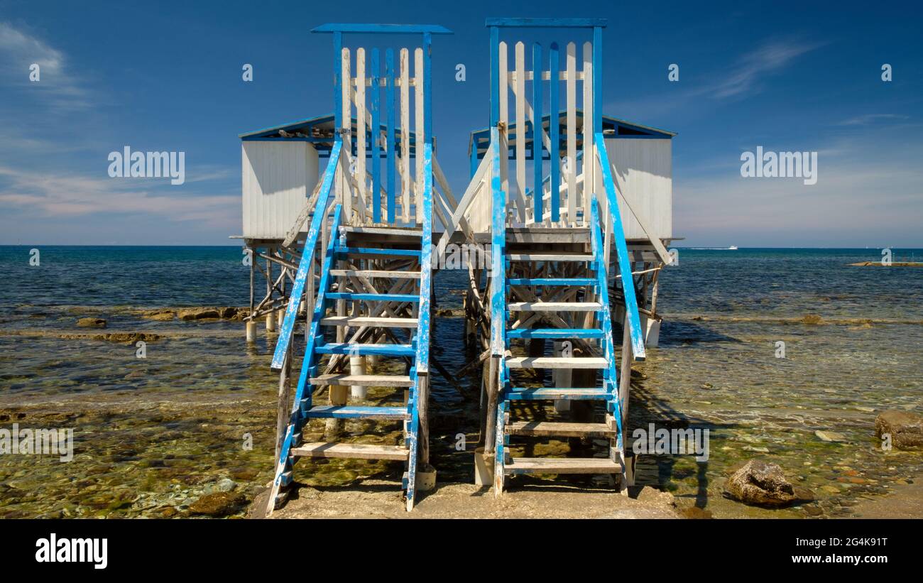 Front view of beach colorful stilt houses also called palafitte in the ...
