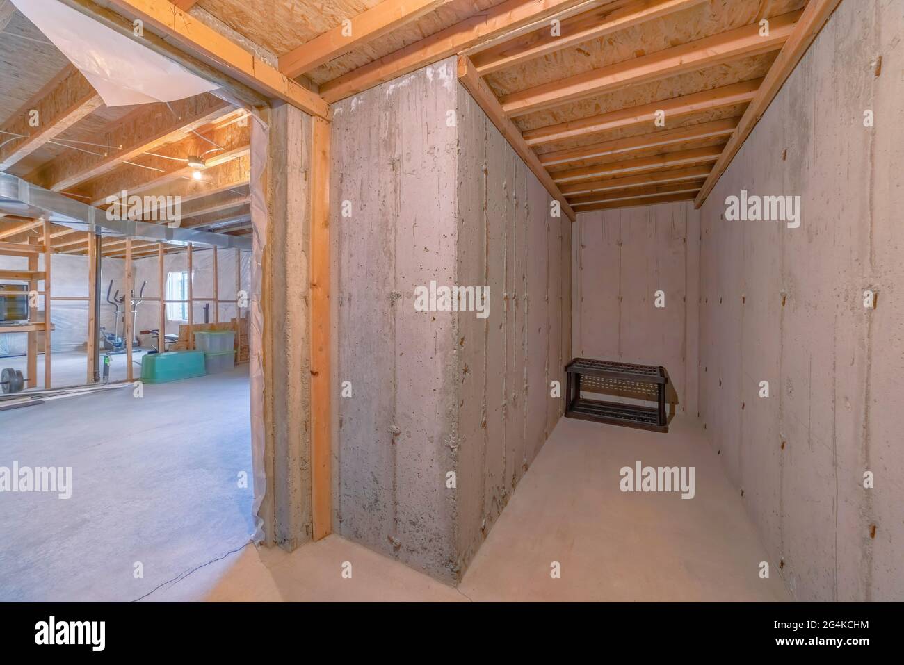 Empty food storage with gray walls Stock Photo - Alamy