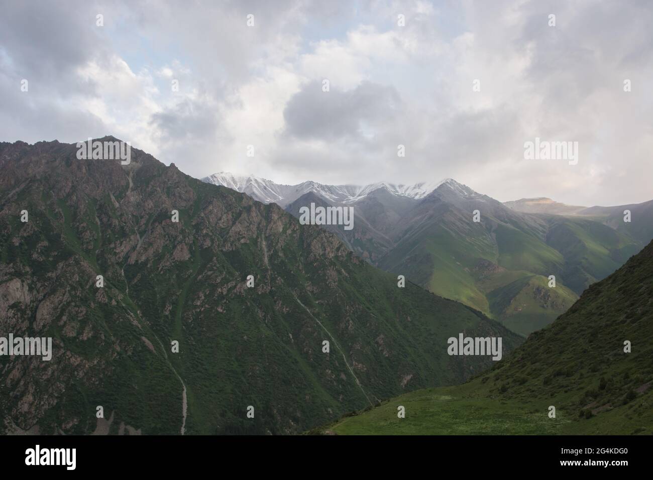 Idyllic winter landscape with hiking trail in the mountains. Rocks ...