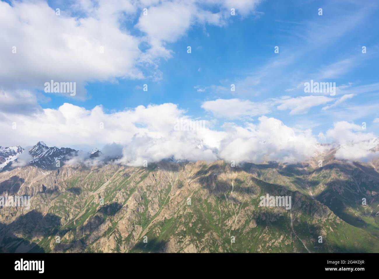 Idyllic winter landscape with hiking trail in the mountains. Rocks ...