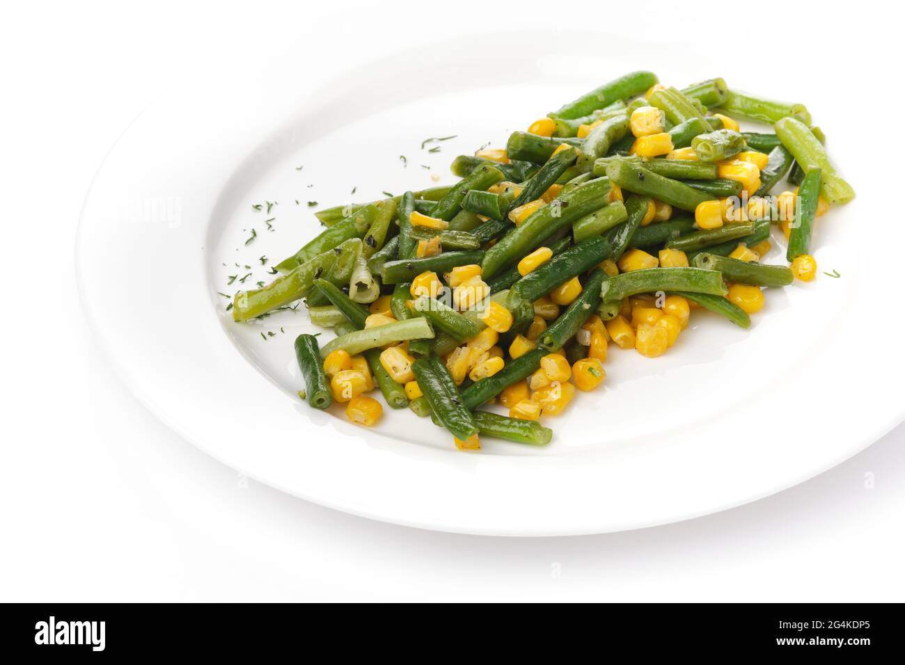 Green beans with corn on a white plate on a white bacgraund Stock Photo ...
