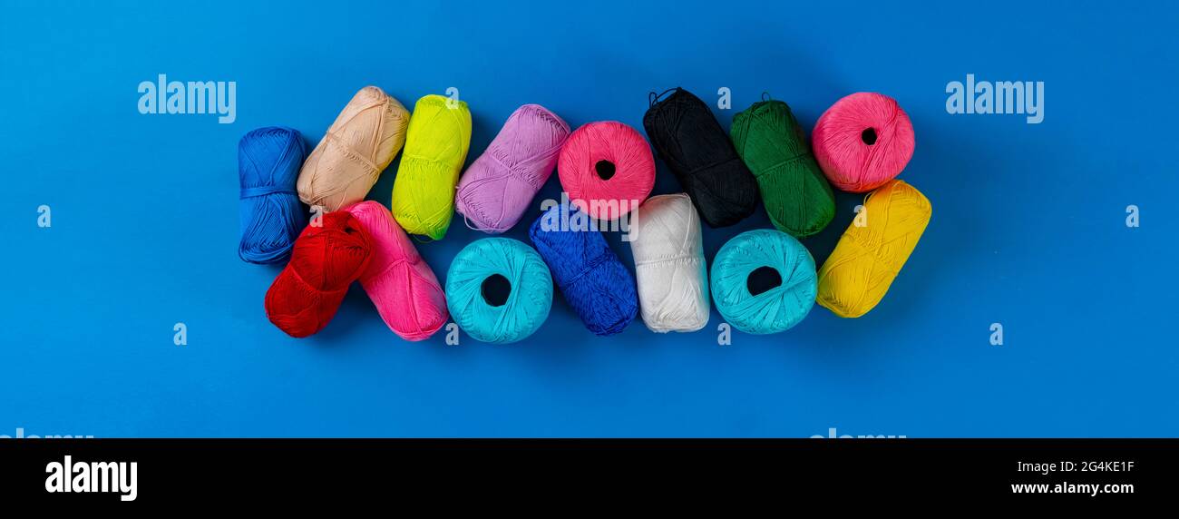 set of different colorful yarn rolls threat for knitting, view from ...