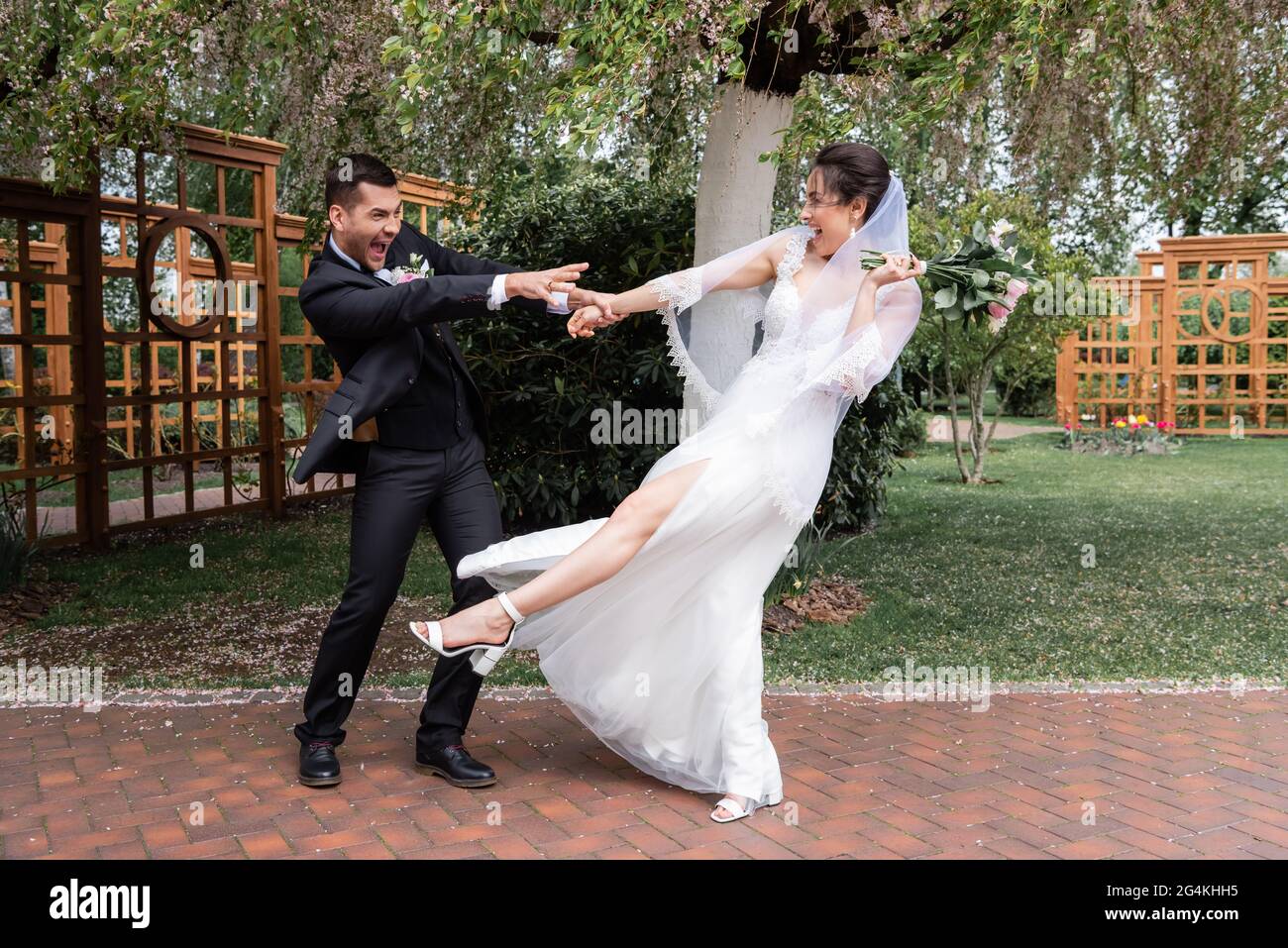 Bridal couple having fun hi-res stock photography and images - Alamy