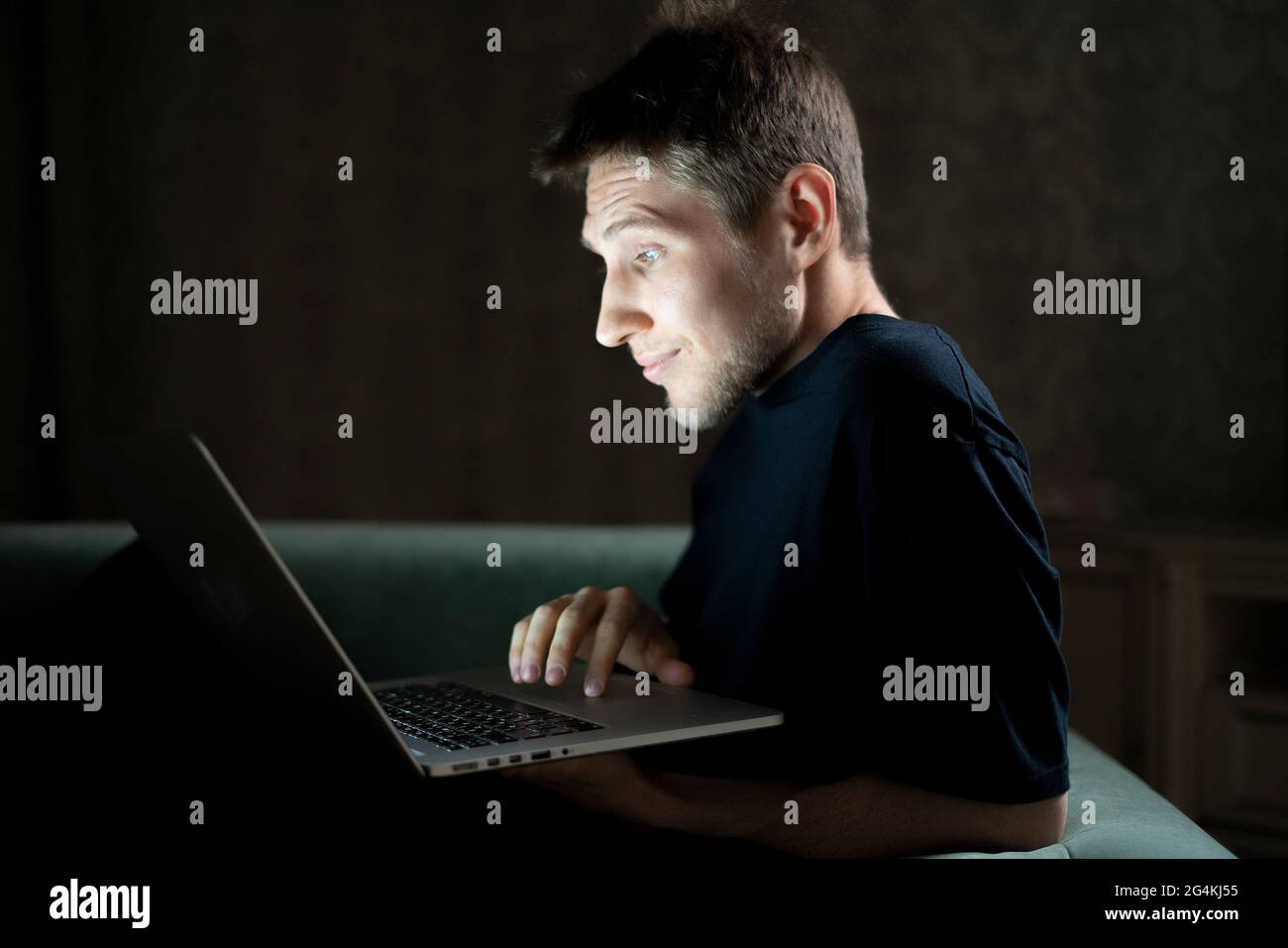 the night social media addiction concept, male person using the digital ...