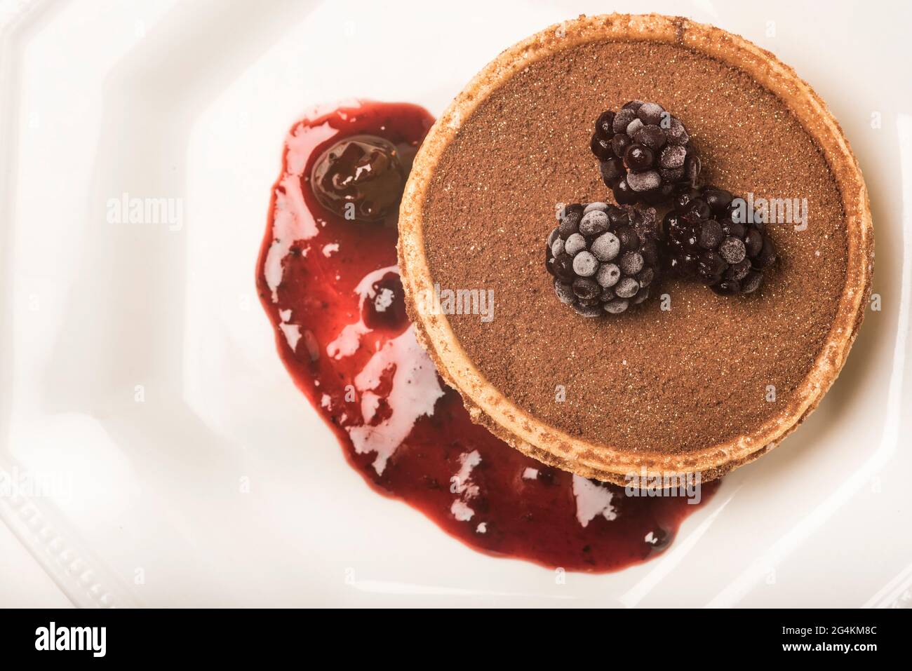 Black Forest tart. A chocolate and blackberry tart decorated with ...