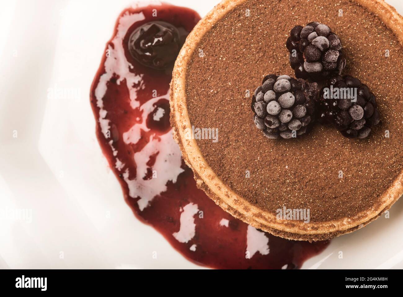 Black Forest tart. A chocolate and blackberry tart decorated with ...
