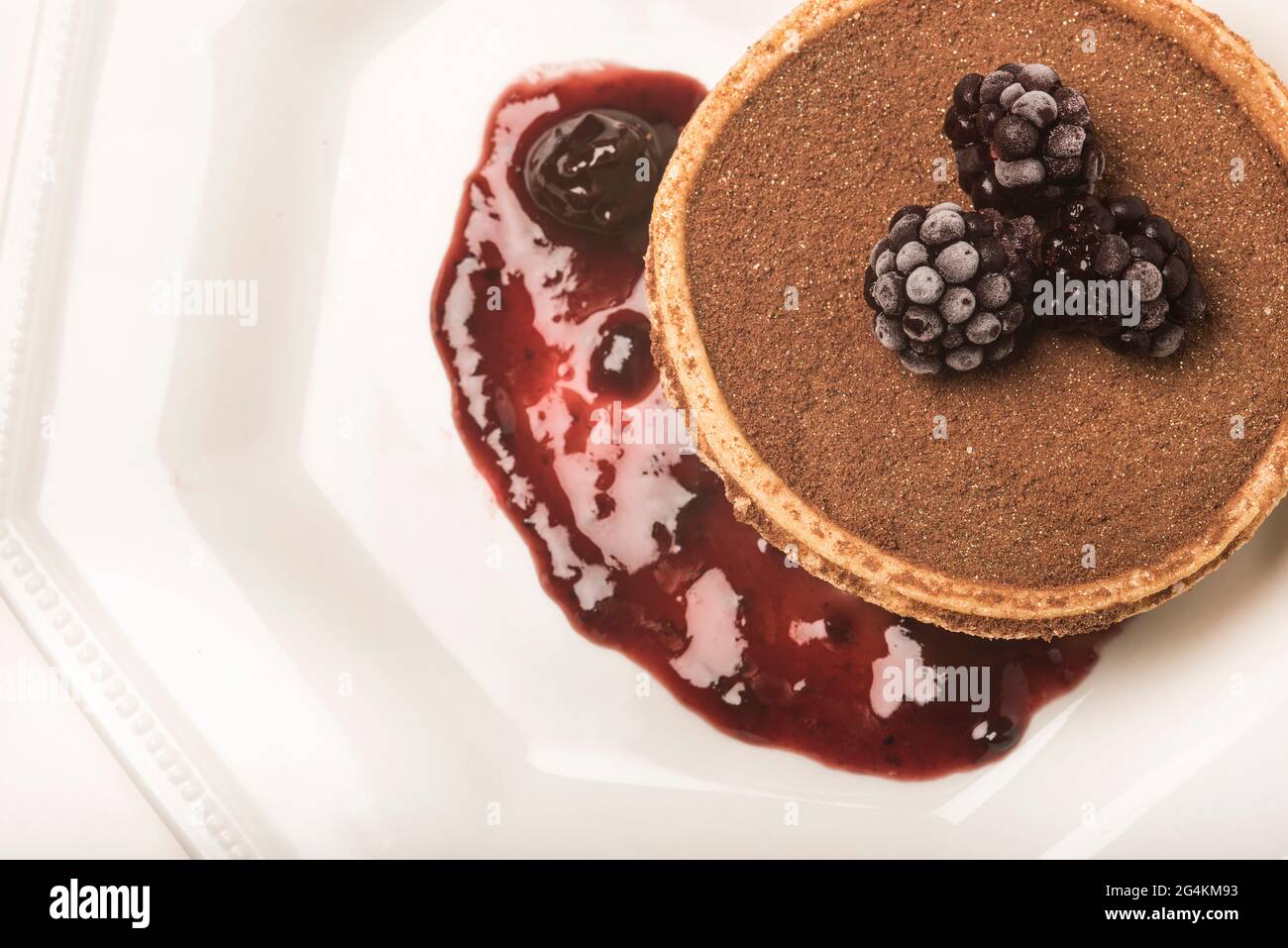 Black Forest tart. A chocolate and blackberry tart decorated with ...