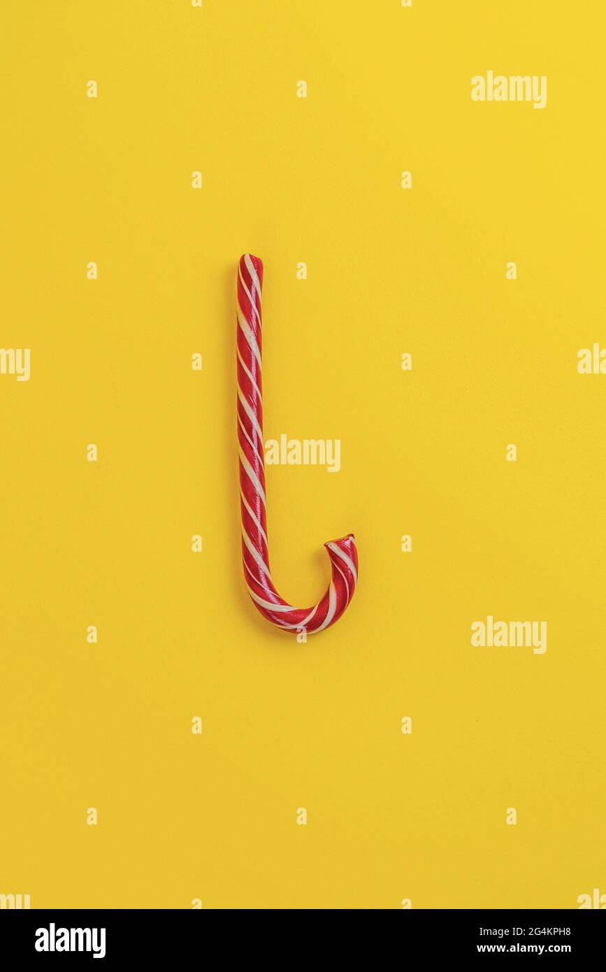 a simple christmas stripped candy flat lay isolated against the ...