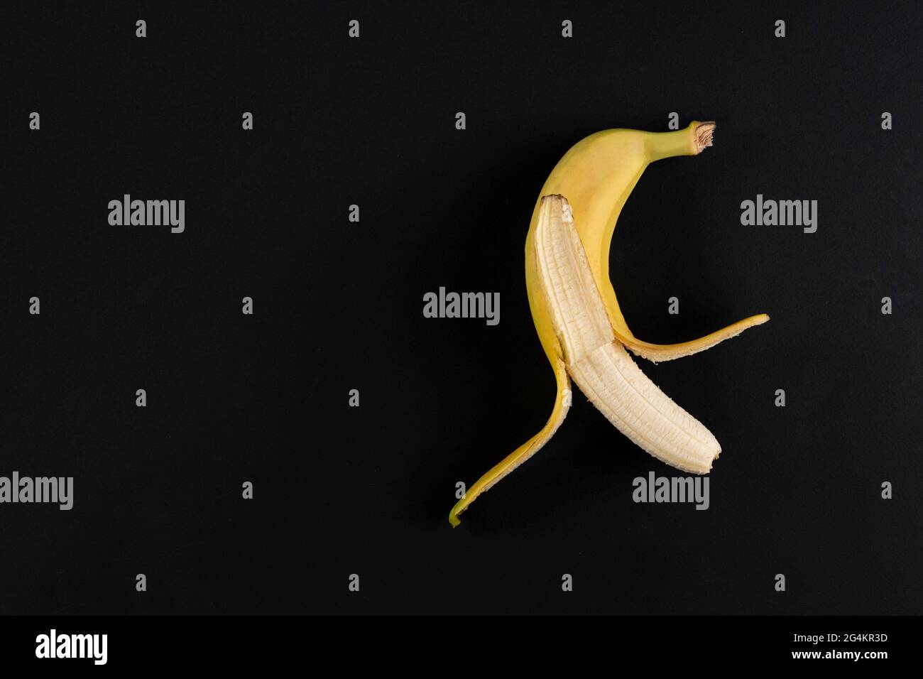 opened banana, open the cover skin of the fruit, isolated colorful ...