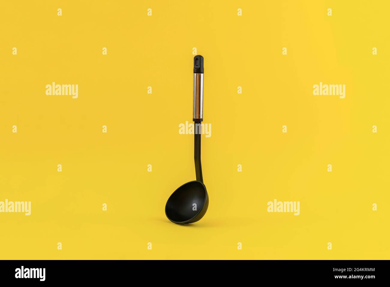 a simple cook food ladle isolated against the colorful background ...