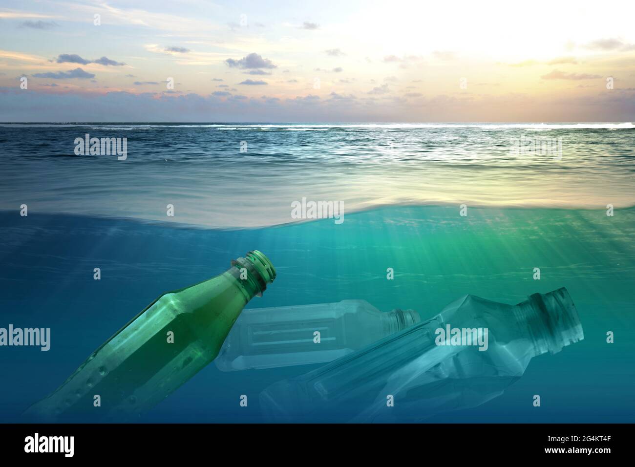 Plastic bottles on the sea. Plastic pollution Stock Photo - Alamy