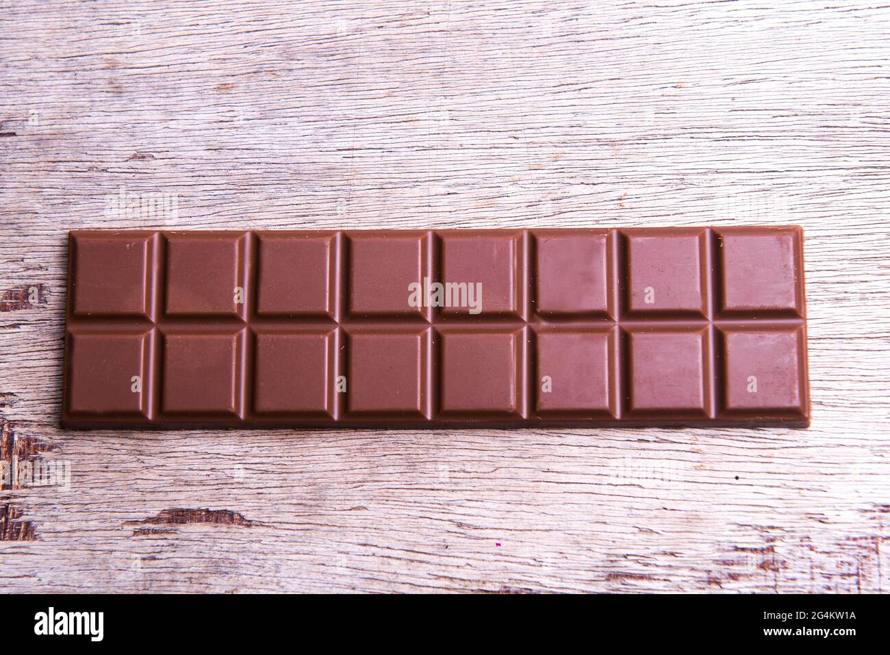 Chocolate bar on the table Stock Photo - Alamy