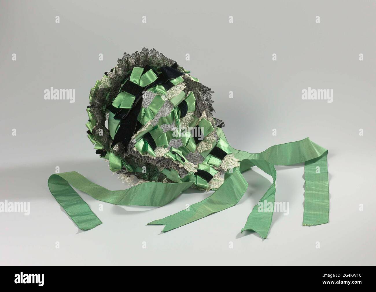 Hang four green silk ribbons hi-res stock photography and images - Alamy