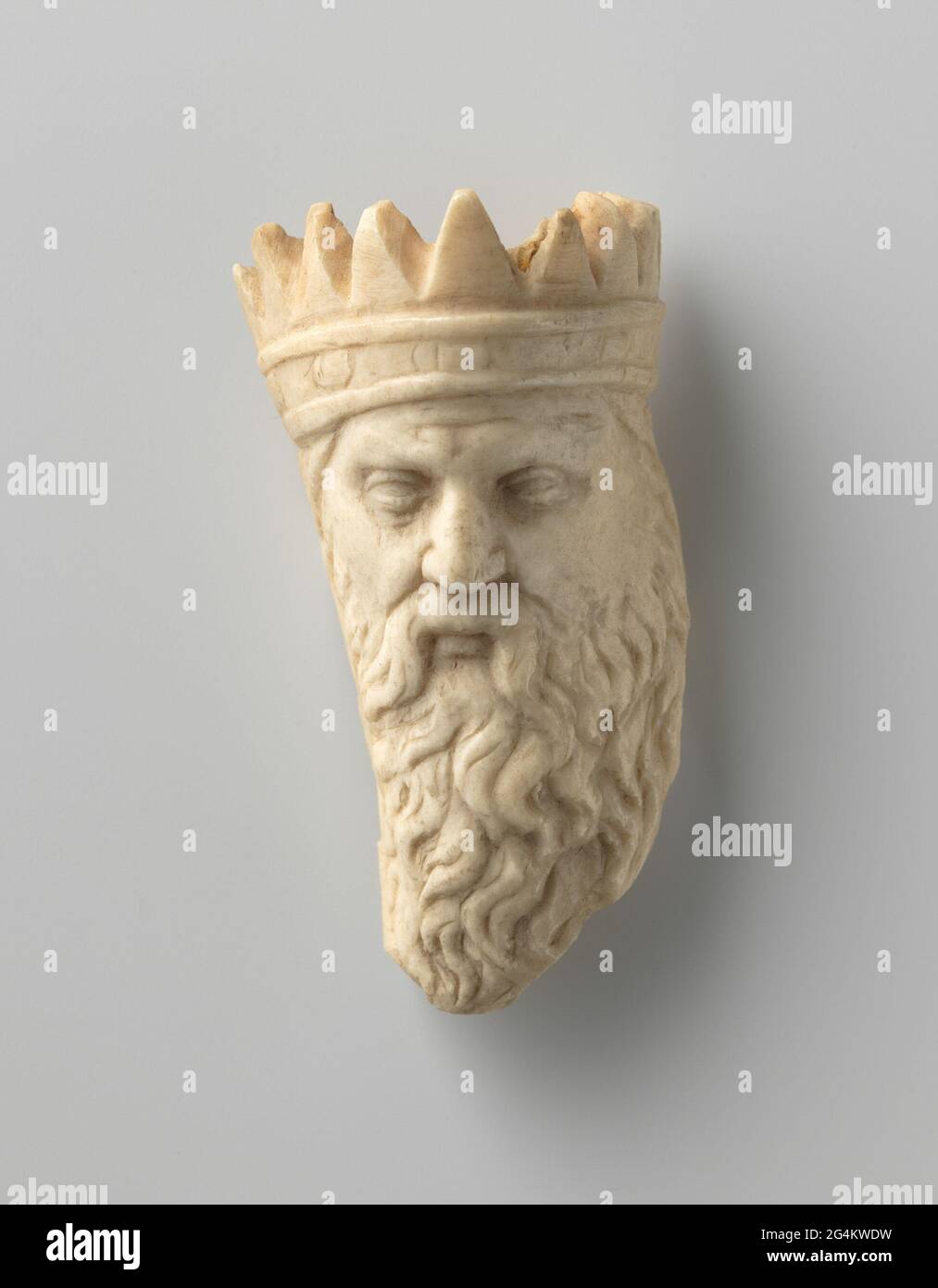 Men's head of ivory with crown. Men's head of ivory with crown (David ...