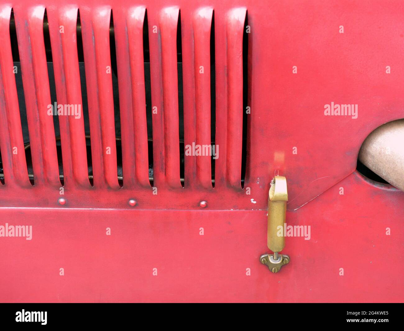 Radiator blinds of a vintage red car Stock Photo - Alamy