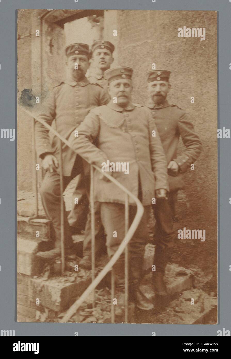 Portrait of four unknown men in uniform on a staircase Stock Photo - Alamy