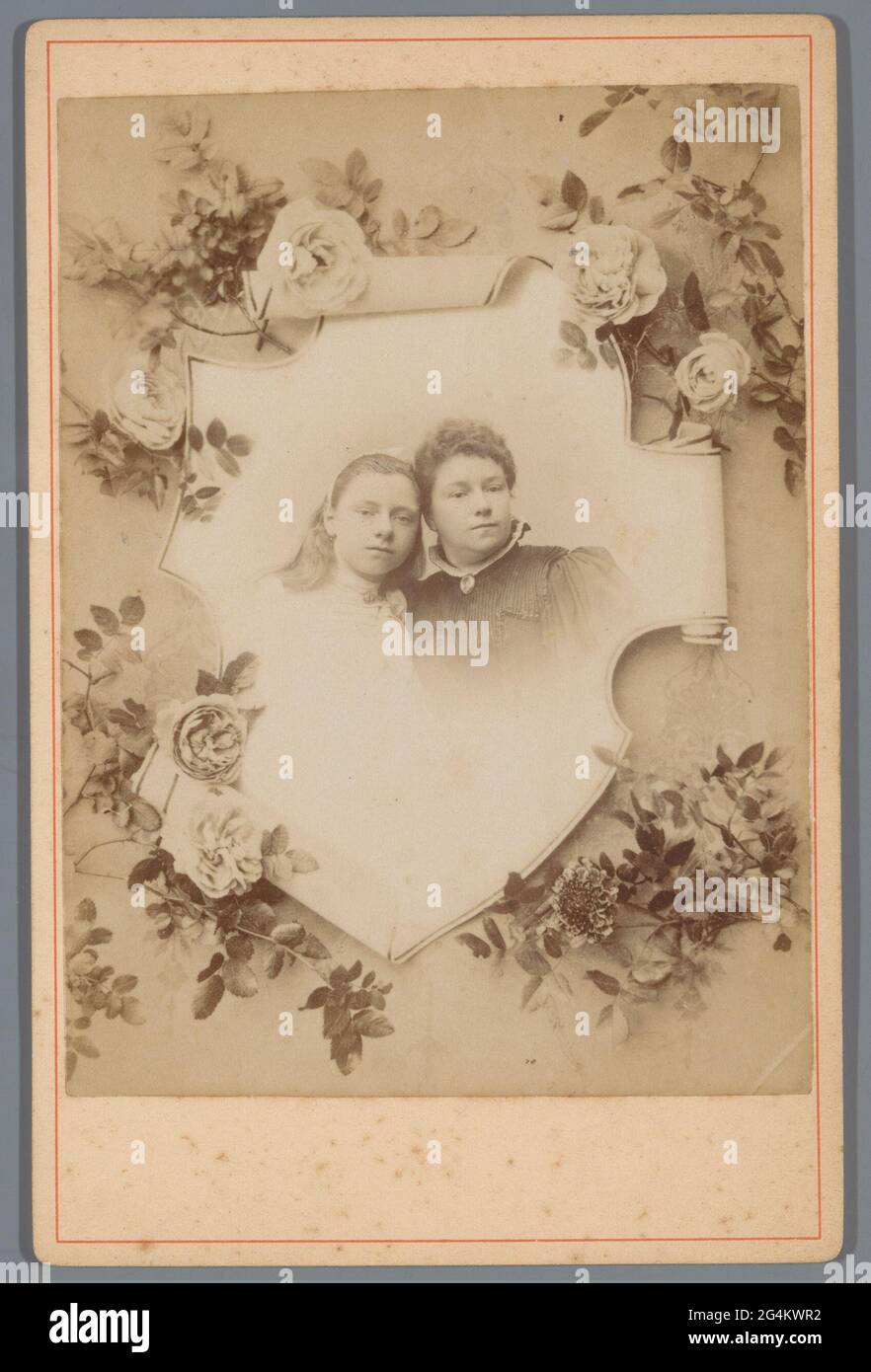 Portrait of an unknown mother and daughter in a picture frame with ...