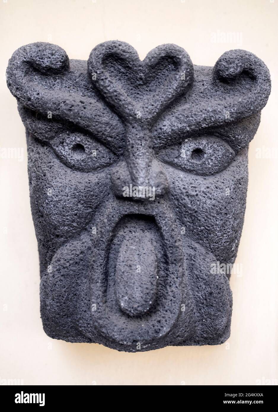lava stone mask Stock Photo - Alamy