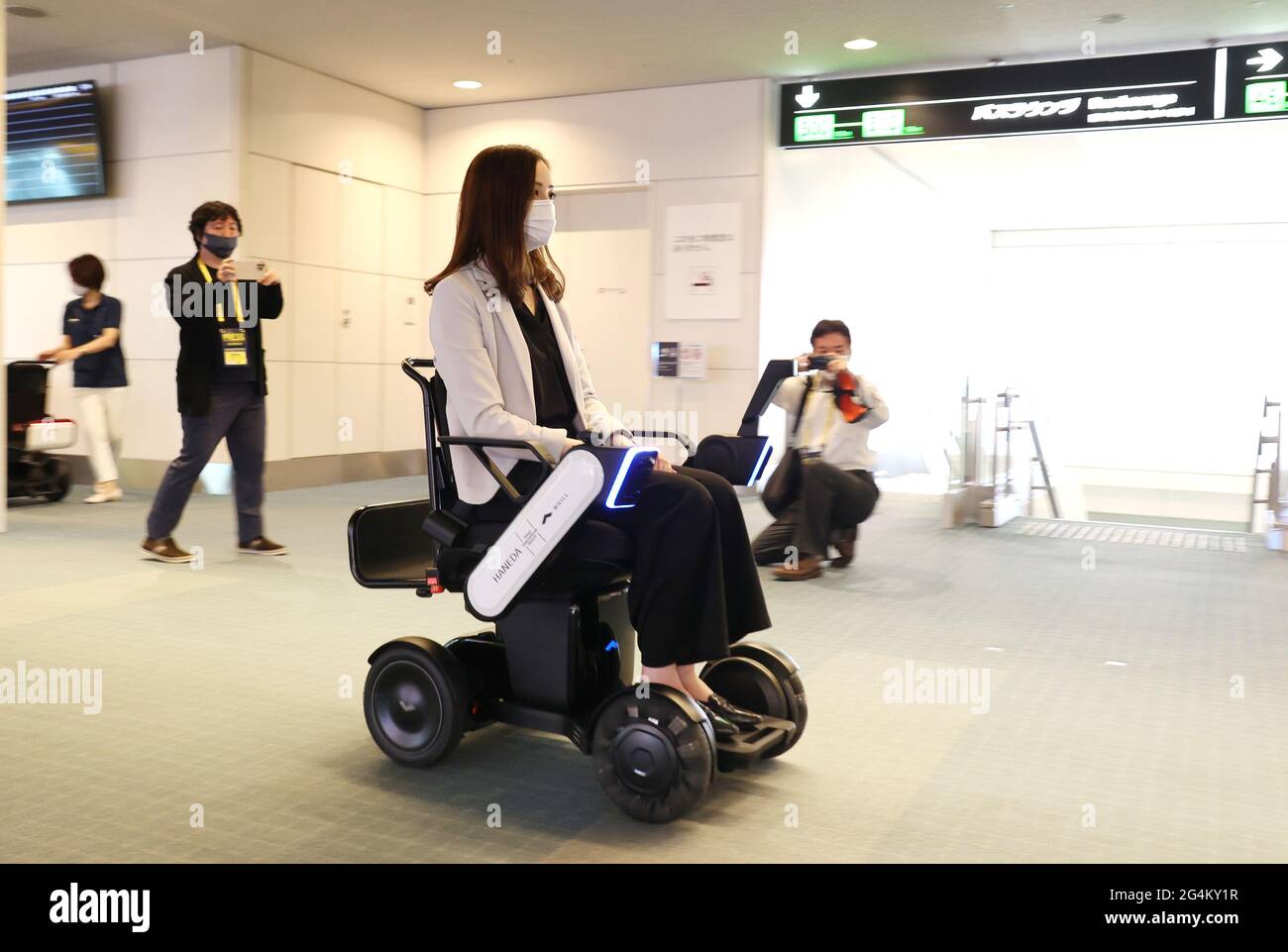 Tokyo, Japan. 22nd June, 2021. A model demonstratess an autonomous ...
