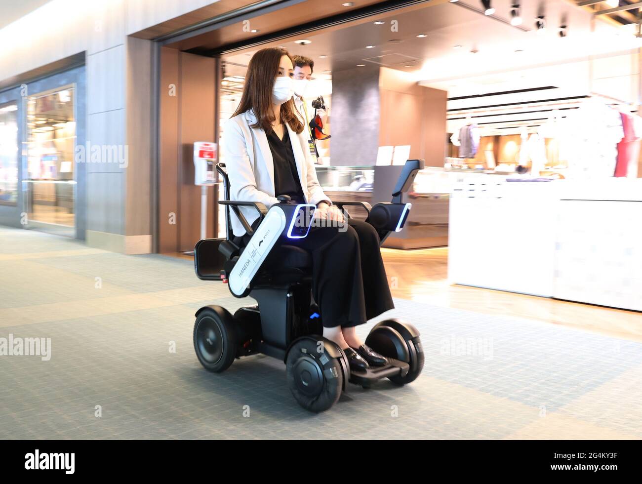 Tokyo, Japan. 22nd June, 2021. A model demonstratess an autonomous ...