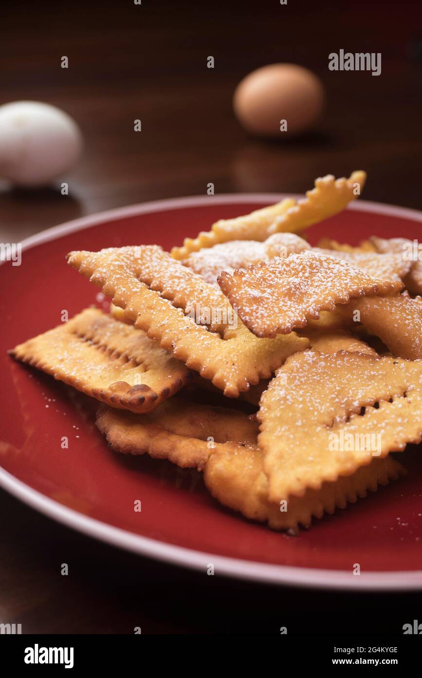 Chiacchiere typical Italian sweets in carnival period Stock Photo - Alamy