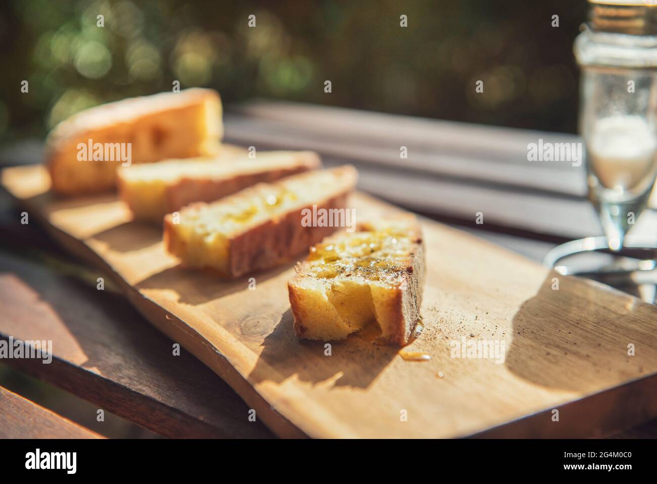 Sicilian olive oil on bread Stock Photo - Alamy