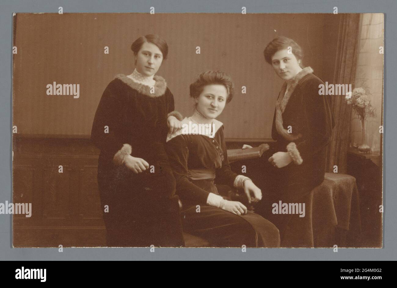 Studio portrait of three unknown women Stock Photo - Alamy