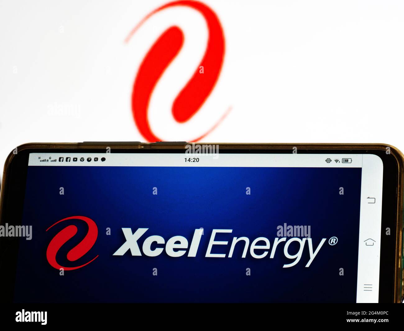 In this photo illustration a Xcel Energy Inc. logo seen displayed on a ...