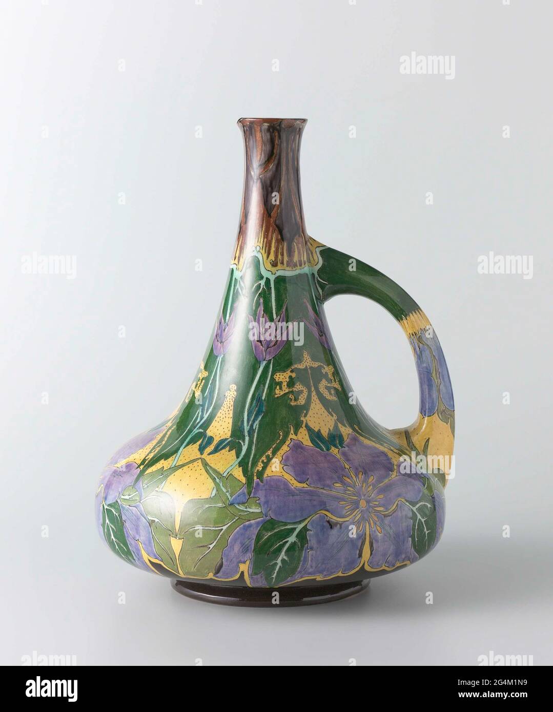 . Can in the form of a vase with wide and flattened body and long neck ...