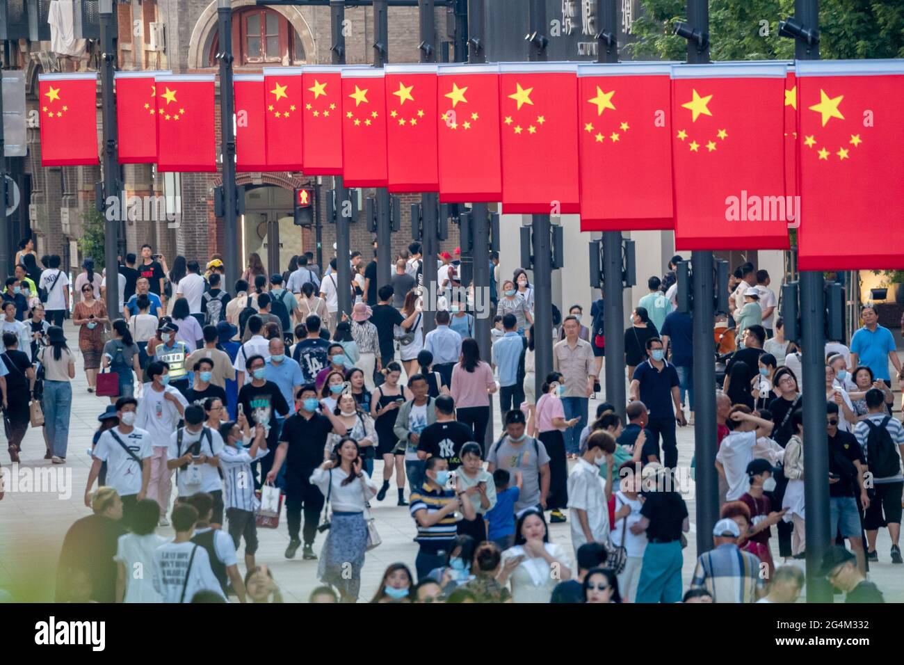 SHANGHAI, CHINA - JUNE 22, 2021 - Five-starred red flags line the ...