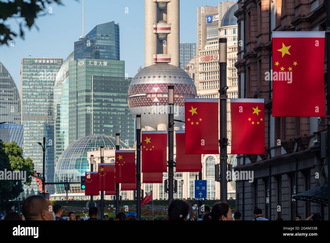 SHANGHAI, CHINA - JUNE 22, 2021 - Five-starred red flags line the ...