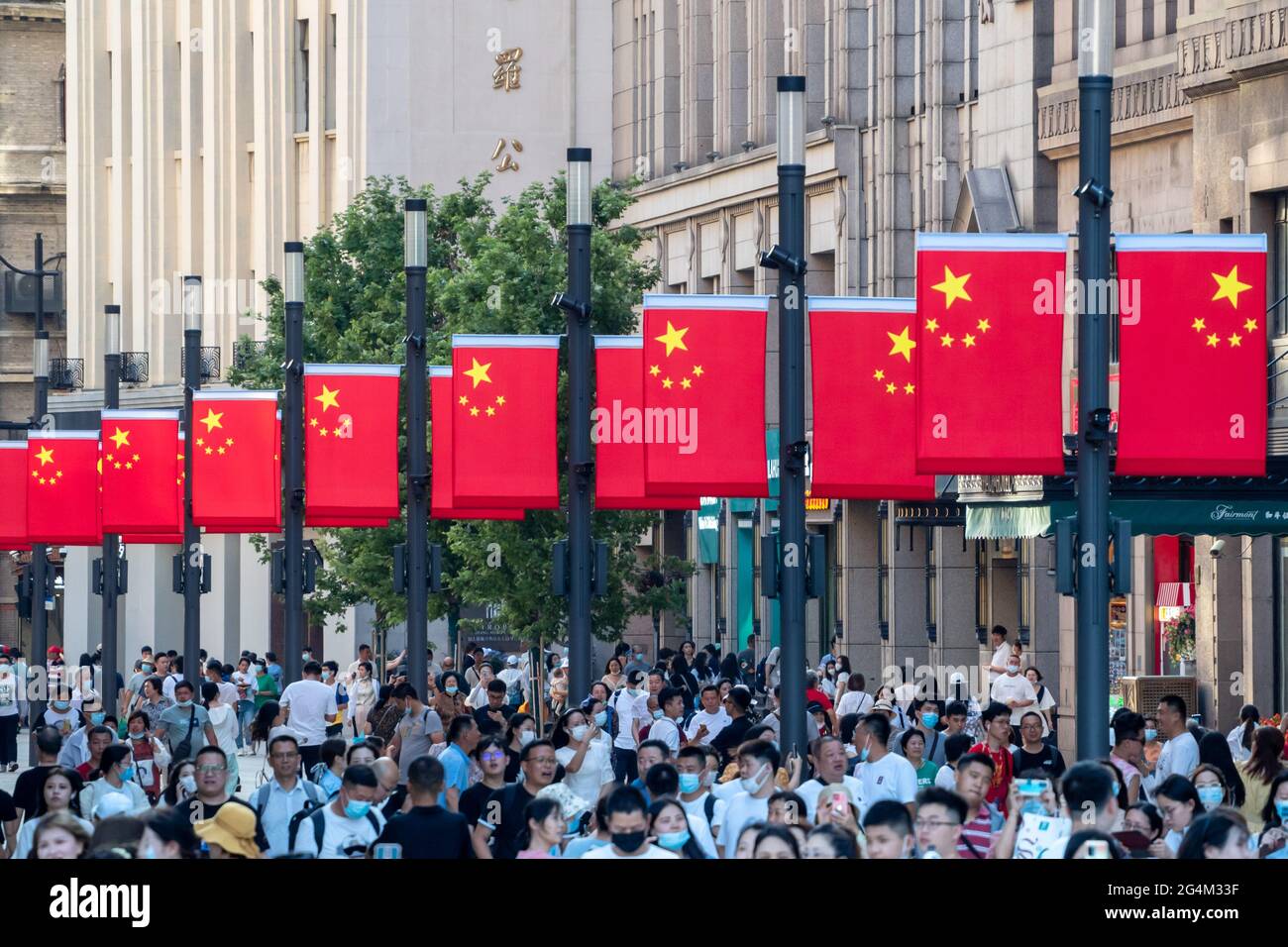 SHANGHAI, CHINA - JUNE 22, 2021 - Five-starred red flags line the ...