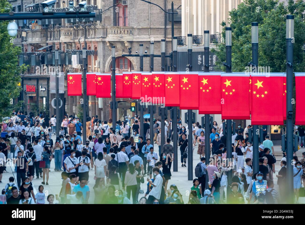 SHANGHAI, CHINA - JUNE 22, 2021 - Five-starred red flags line the ...