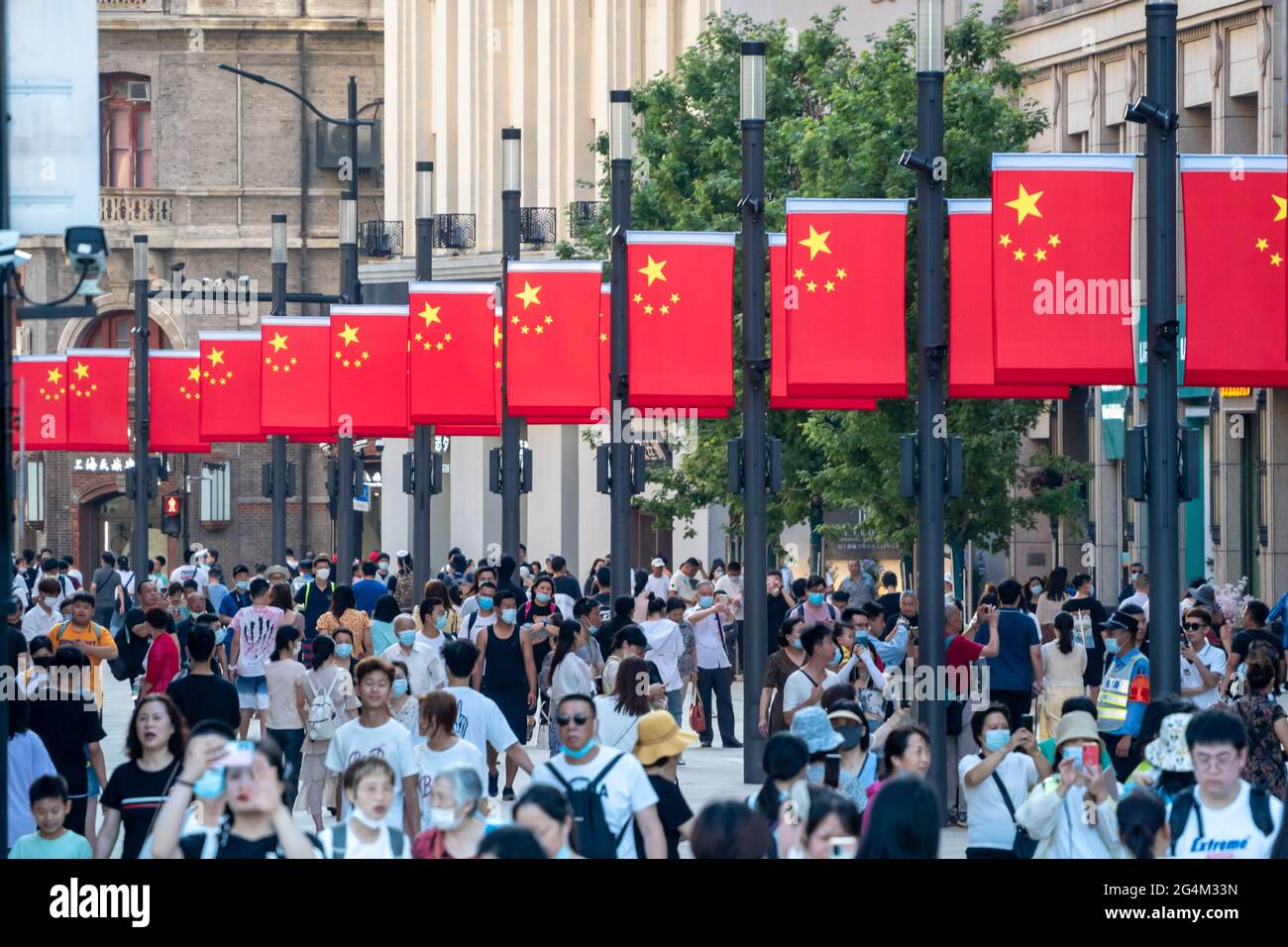 SHANGHAI, CHINA - JUNE 22, 2021 - Five-starred red flags line the ...