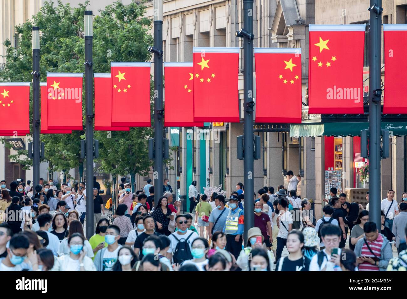 SHANGHAI, CHINA - JUNE 22, 2021 - Five-starred red flags line the ...